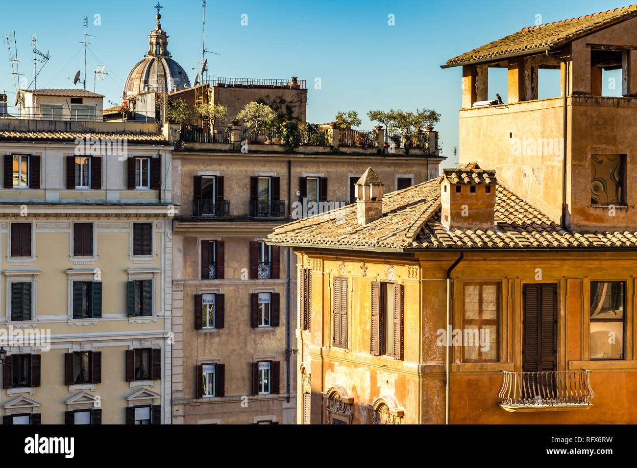 typical ancient buildings in fascinating street of Rome Stock Photo - Alamy