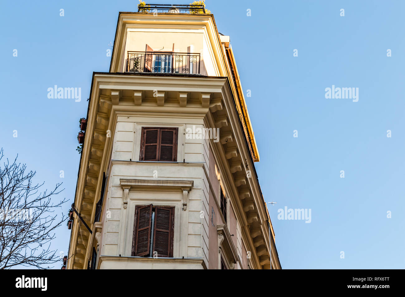 typical ancient buildings in fascinating street of Rome Stock Photo - Alamy