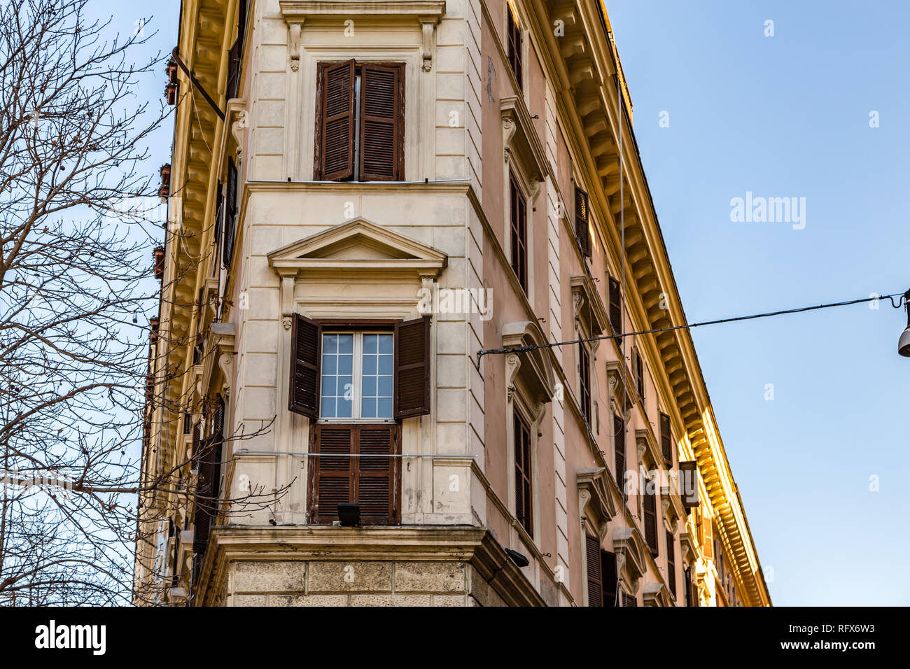 typical ancient buildings in fascinating street of Rome Stock Photo - Alamy