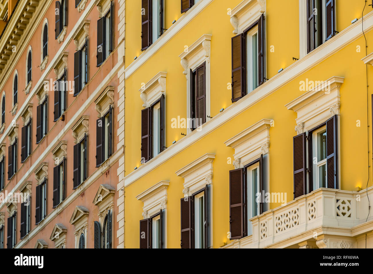 typical ancient buildings in fascinating street of Rome Stock Photo - Alamy