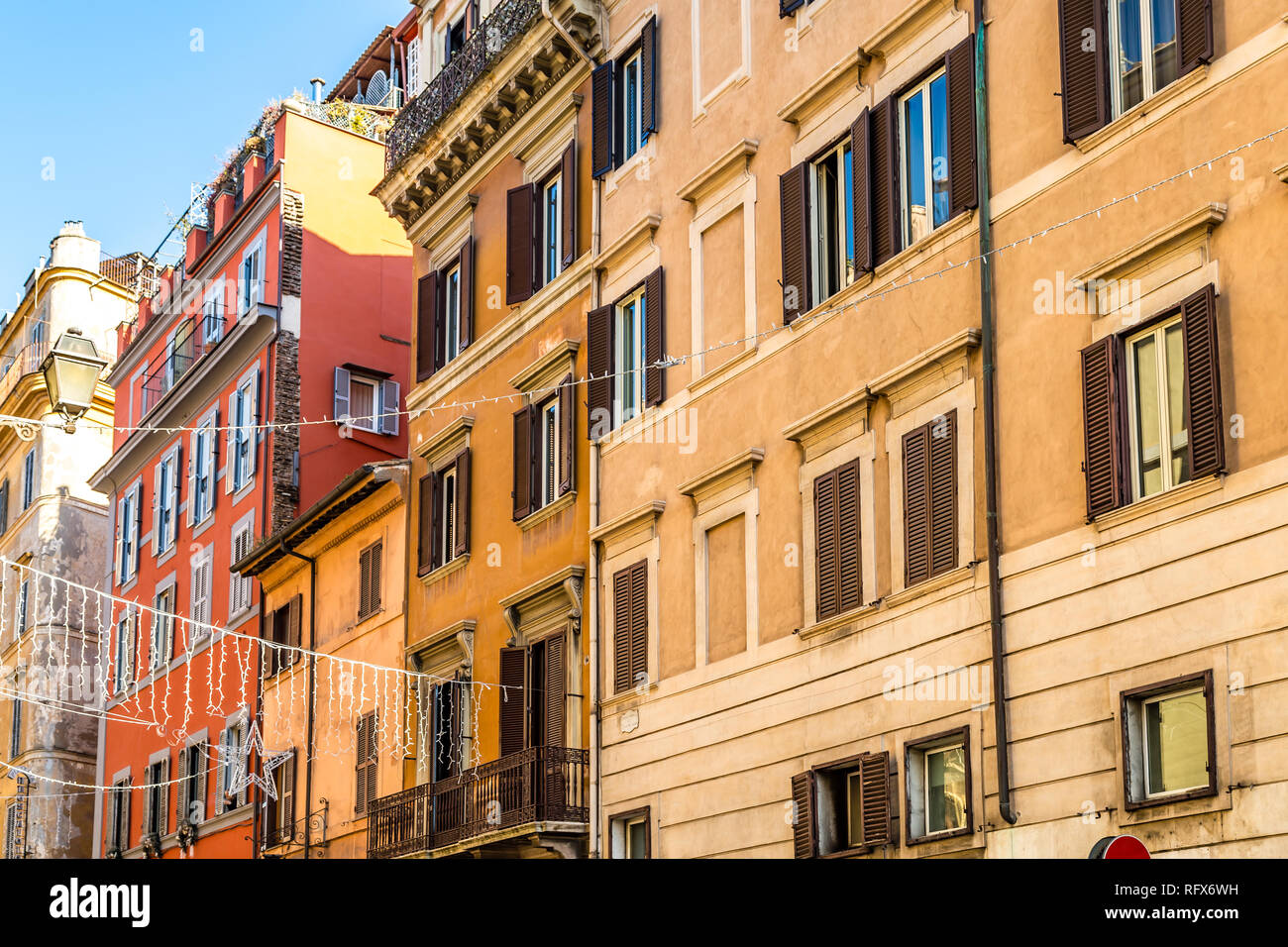 typical ancient buildings in fascinating street of Rome Stock Photo - Alamy