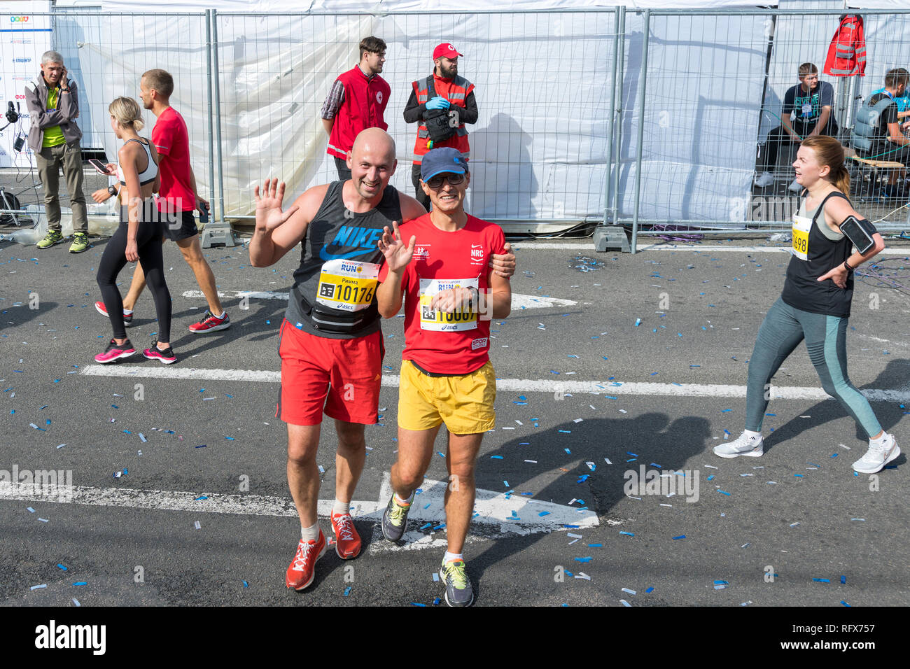 Ukraine, Kiev, Ukraine 09.09.2018 Two happy athletes after the marathon ...
