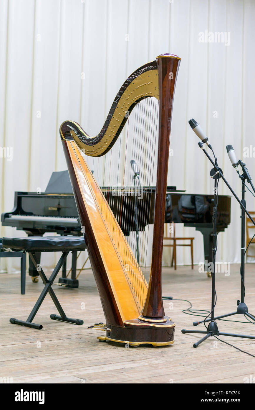 harp on stage. vertical photo Stock Photo - Alamy