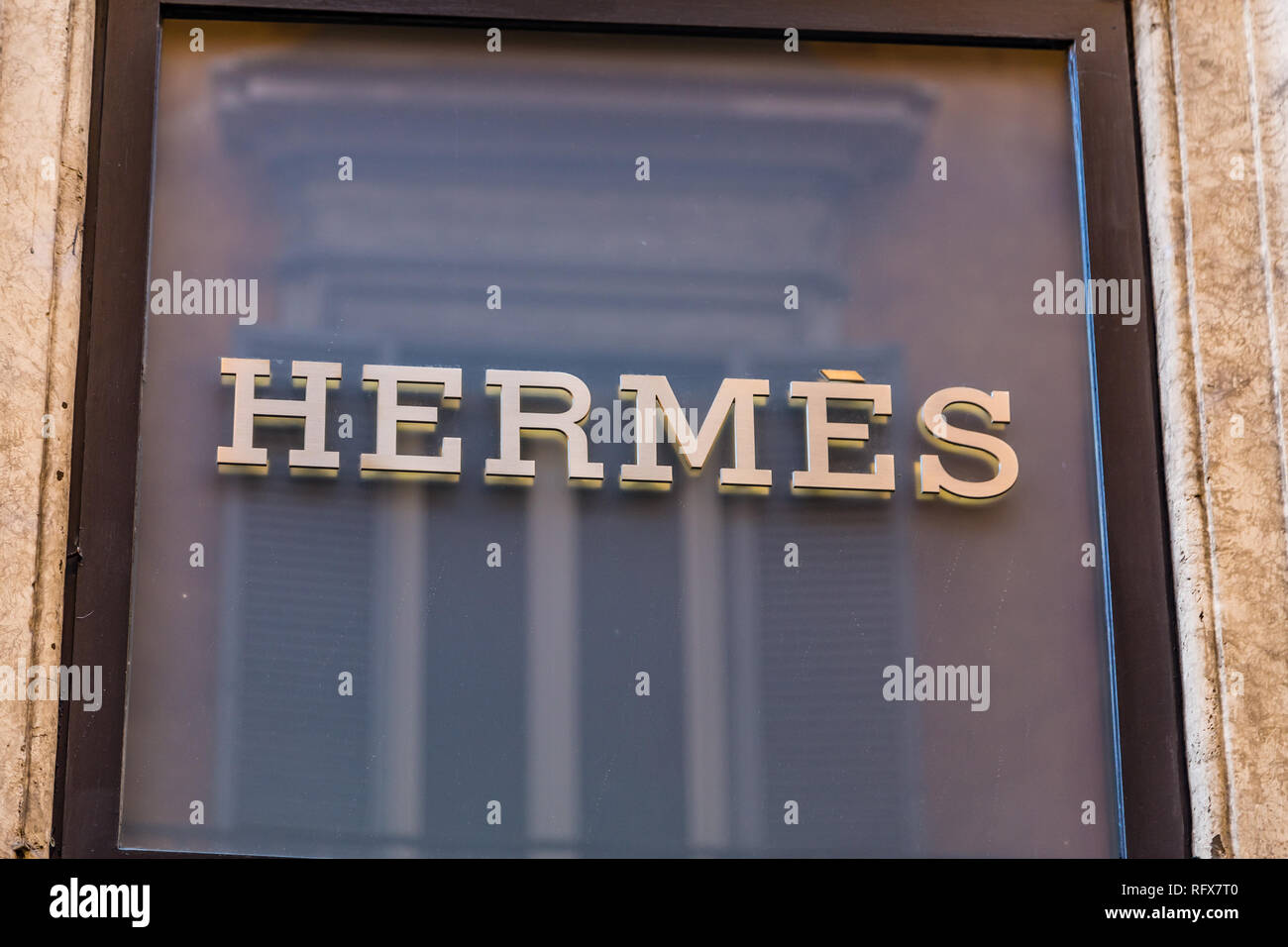ROME, ITALY - JANUARY 3, 2019: lights are enlightening HERMES logo on ...