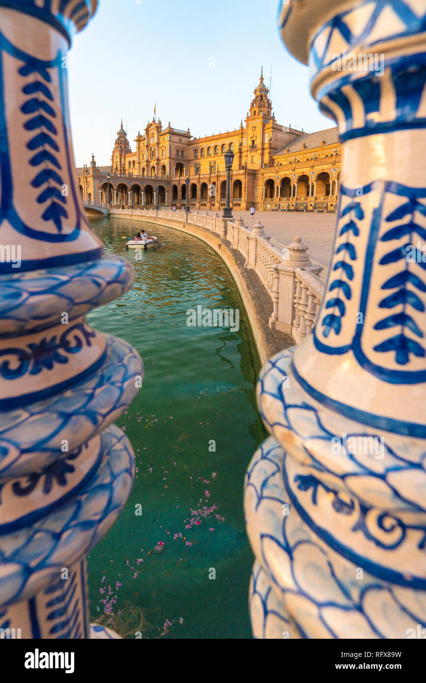 Close-up of pillars of a glazed ceramic balustrade along the canal ...