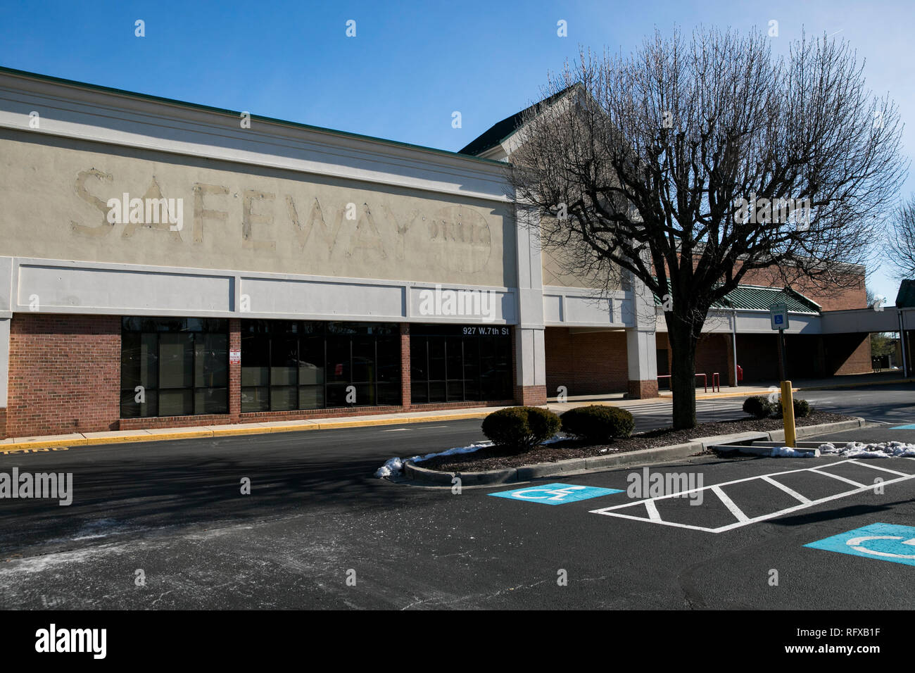 The outline of a logo sign outside of an abandoned Safeway grocery ...