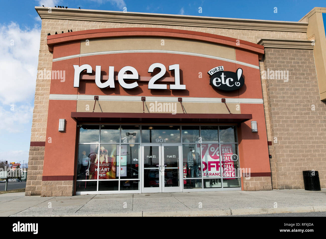A logo sign outside of a rue21 retail store location in Chambersburg ...