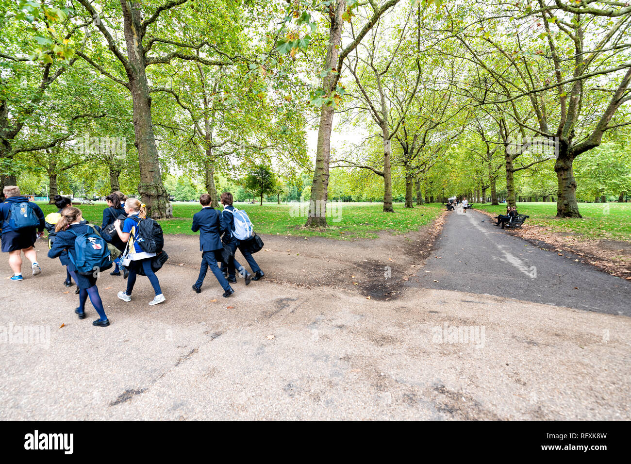 Uniform school children walking home hi-res stock photography and ...