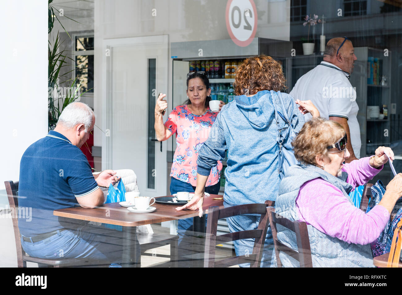 Elderly couple drinking coffee cafe hi-res stock photography and images ...