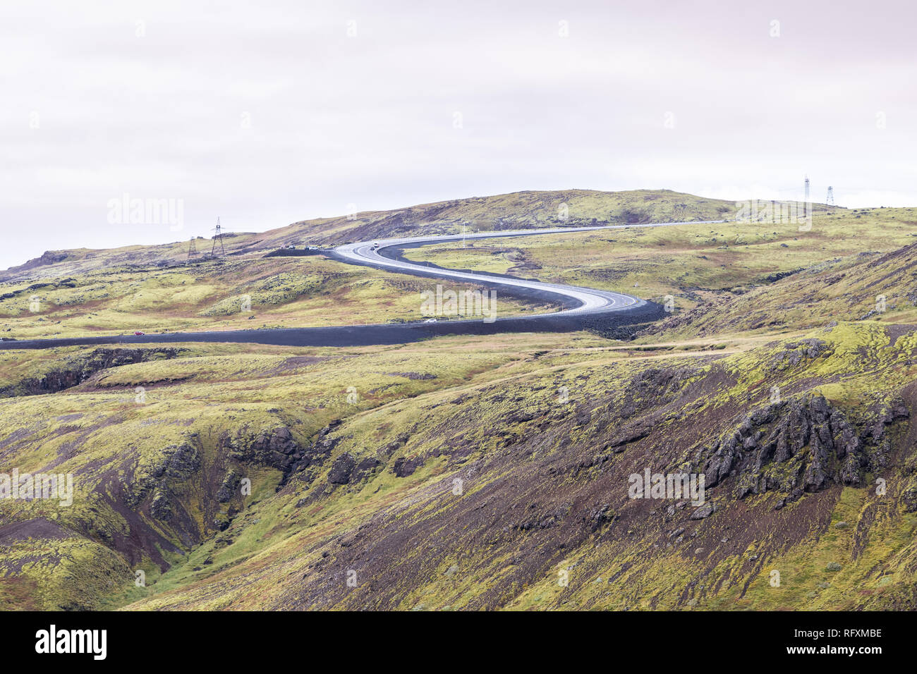 Hveragerdi, Iceland View of road trip cars in winding road traffic on ...