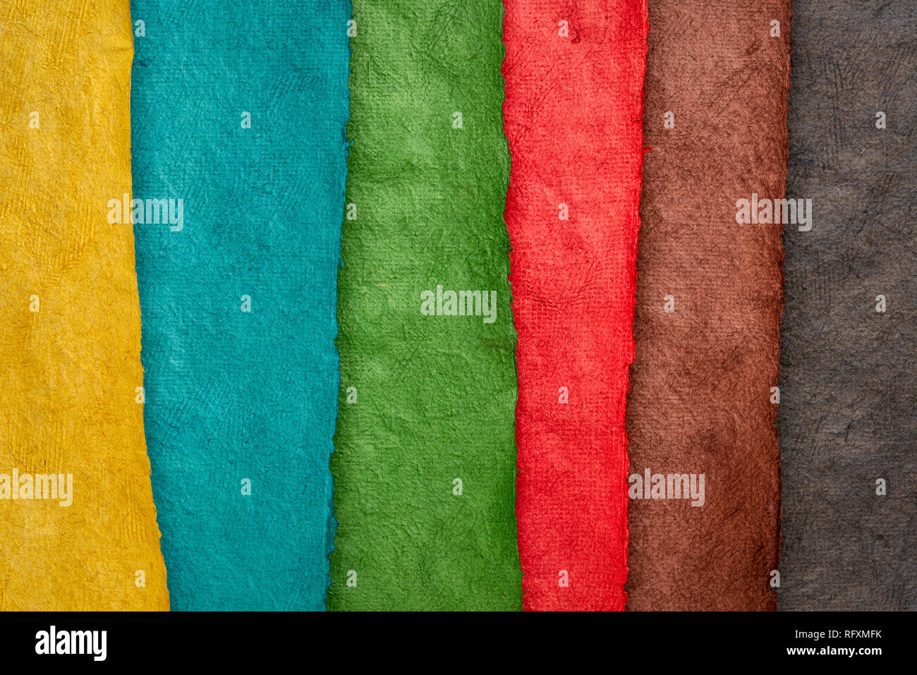 collection of colorful handmade Huun Mayan paper sheets created by ...