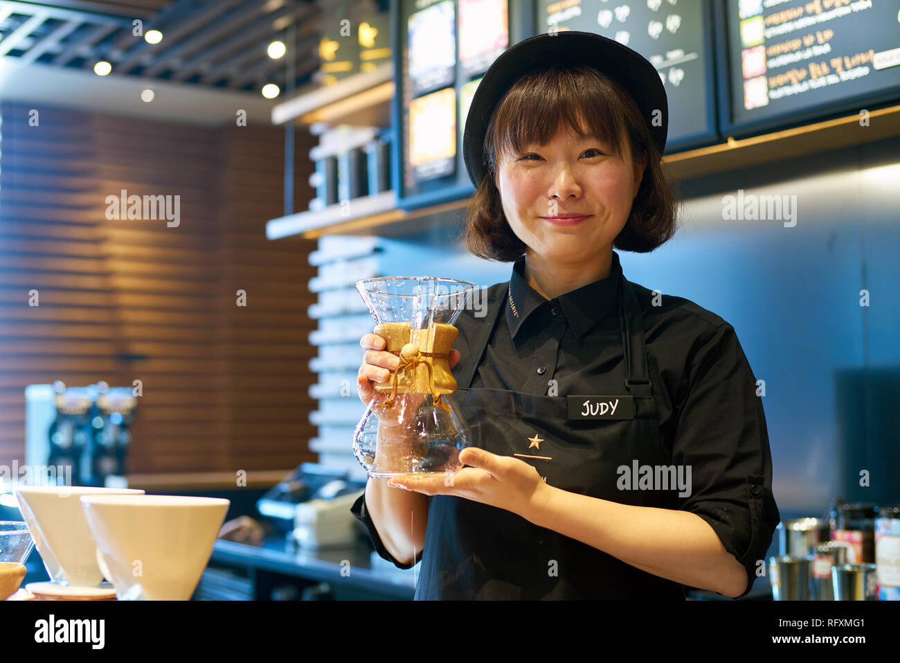 SEOUL, SOUTH KOREA - CIRCA MAY, 2017: indoor portrait of a worker at ...