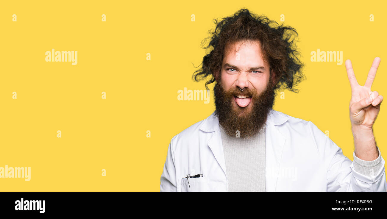 Crazy scientist with funny long hair smiling with happy face winking at ...