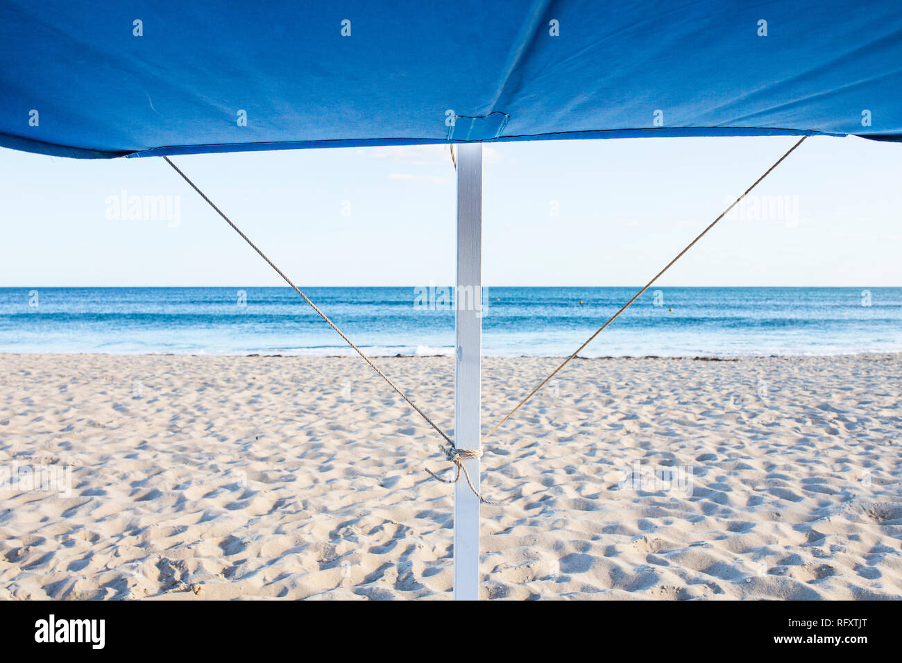 Awning structure for beach chair. Beach background Stock Photo - Alamy