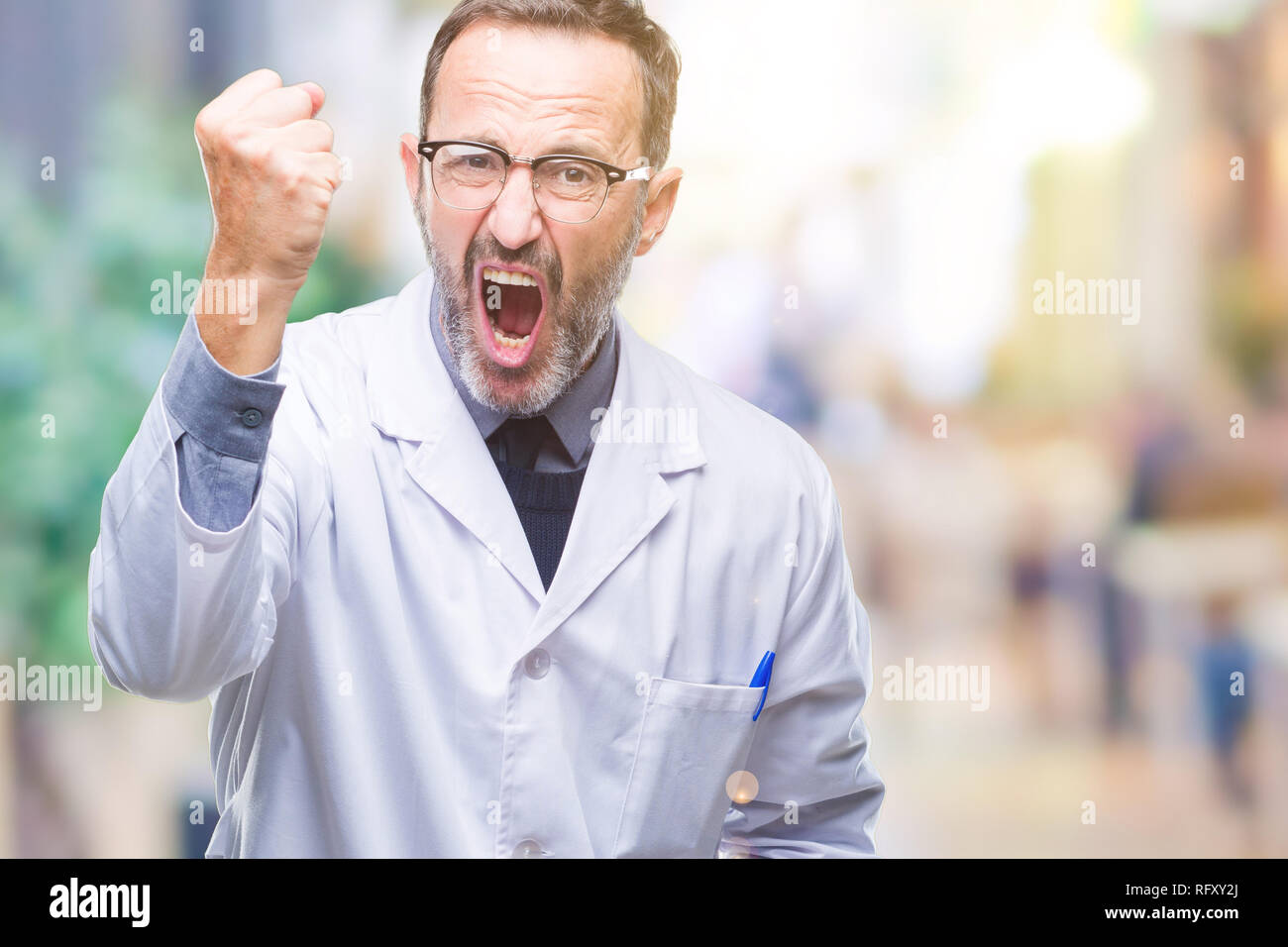 Middle age senior hoary professional man wearing white coat over ...