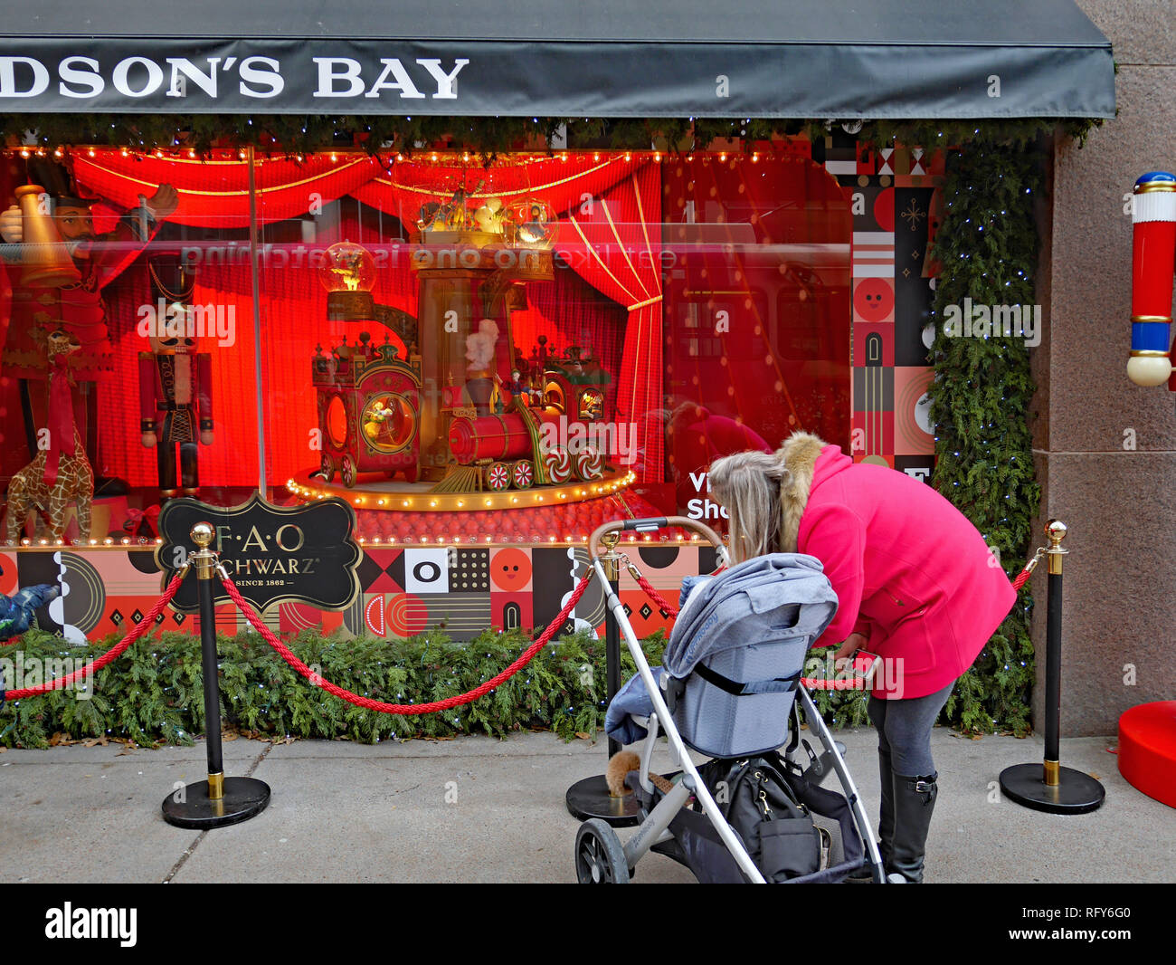 Child looking toy shop window hi-res stock photography and images - Alamy