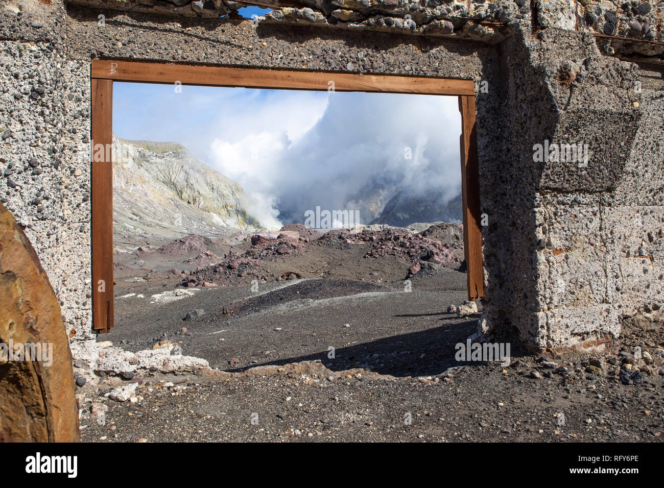 A perfectly framed view of destruction, from the remains of a building ...