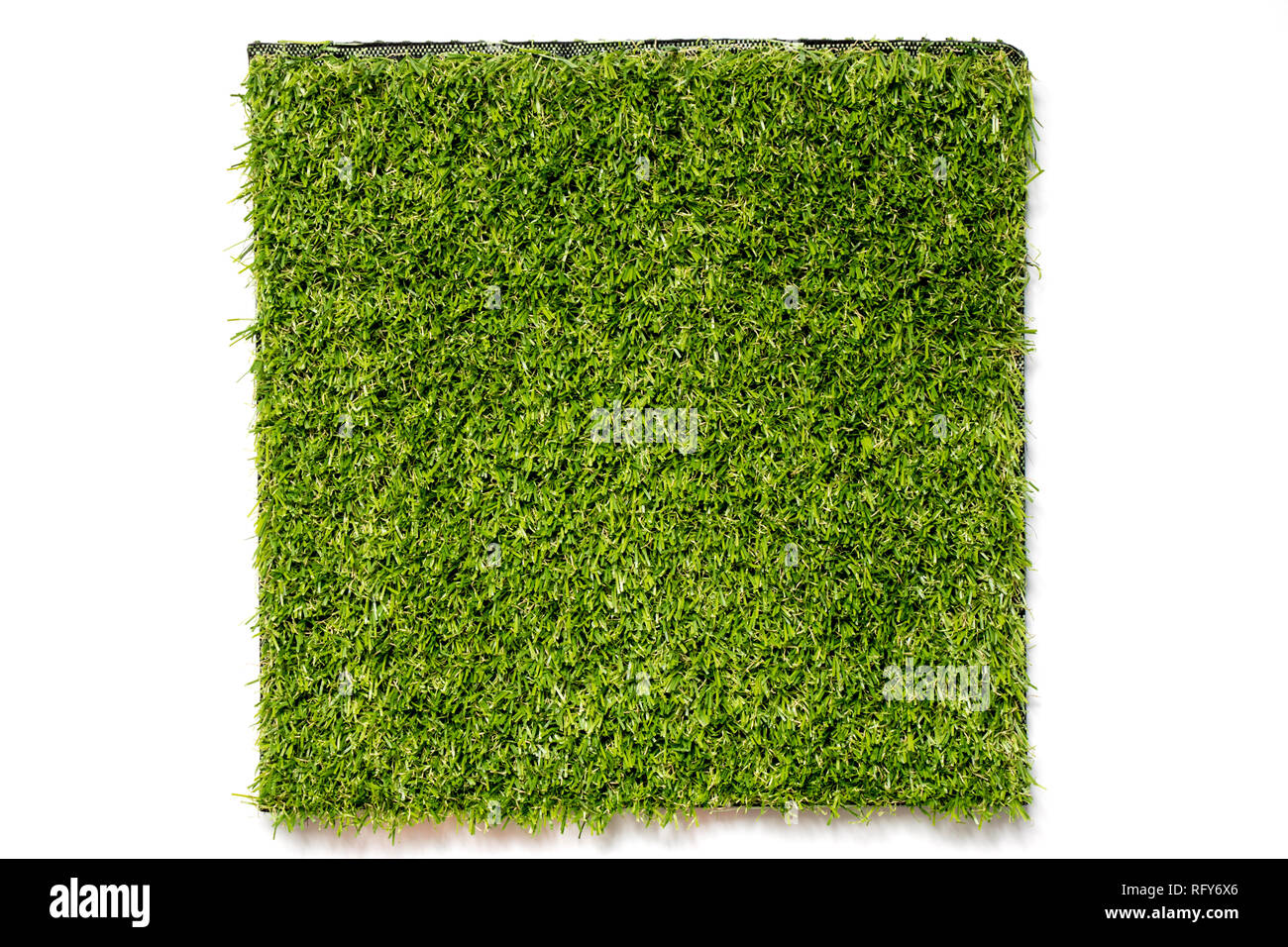 Artificial green grass in square plate on white background Stock Photo ...