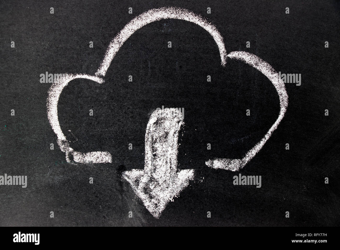 White chalk drawing as cloud and down arrow icon on black board ...