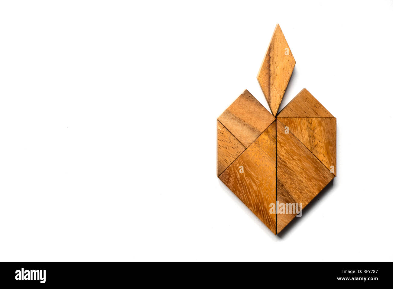 Wooden tangram puzzle in apple shape on white background Stock Photo ...