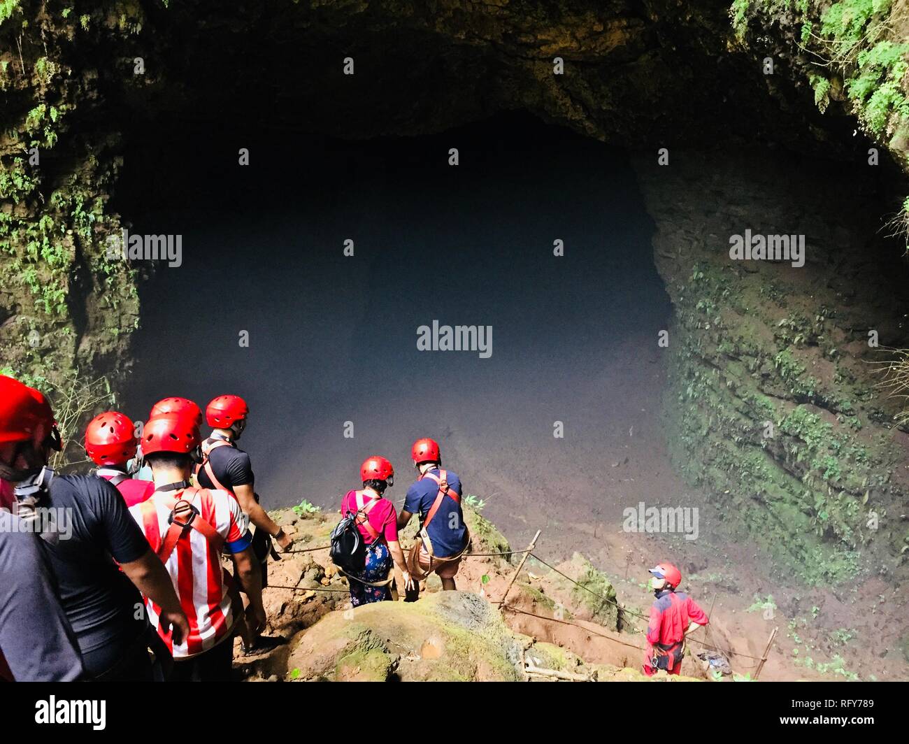 Exploring the beauty of the Gua Jomblang Stock Photo - Alamy