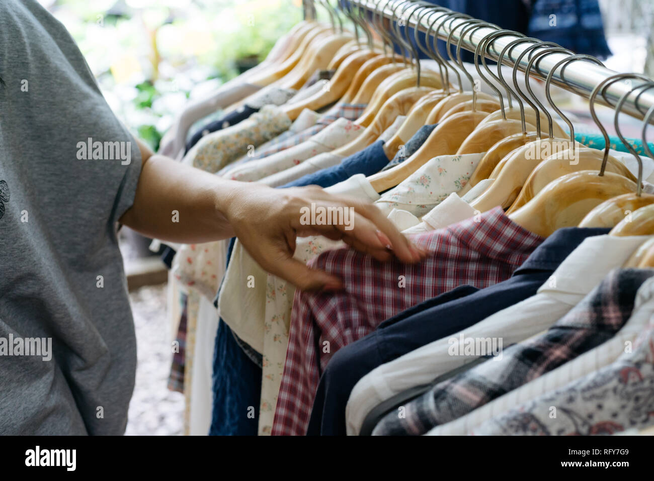 Clothes on rack hi-res stock photography and images - Alamy