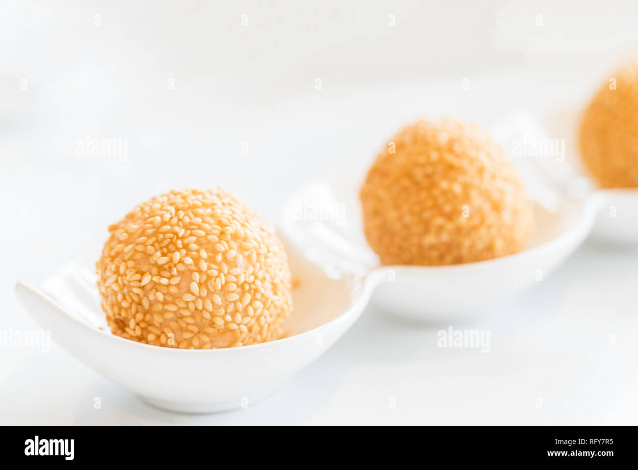 Chinese dim sum Fried sesame balls stuff with custard lava - Chinese ...