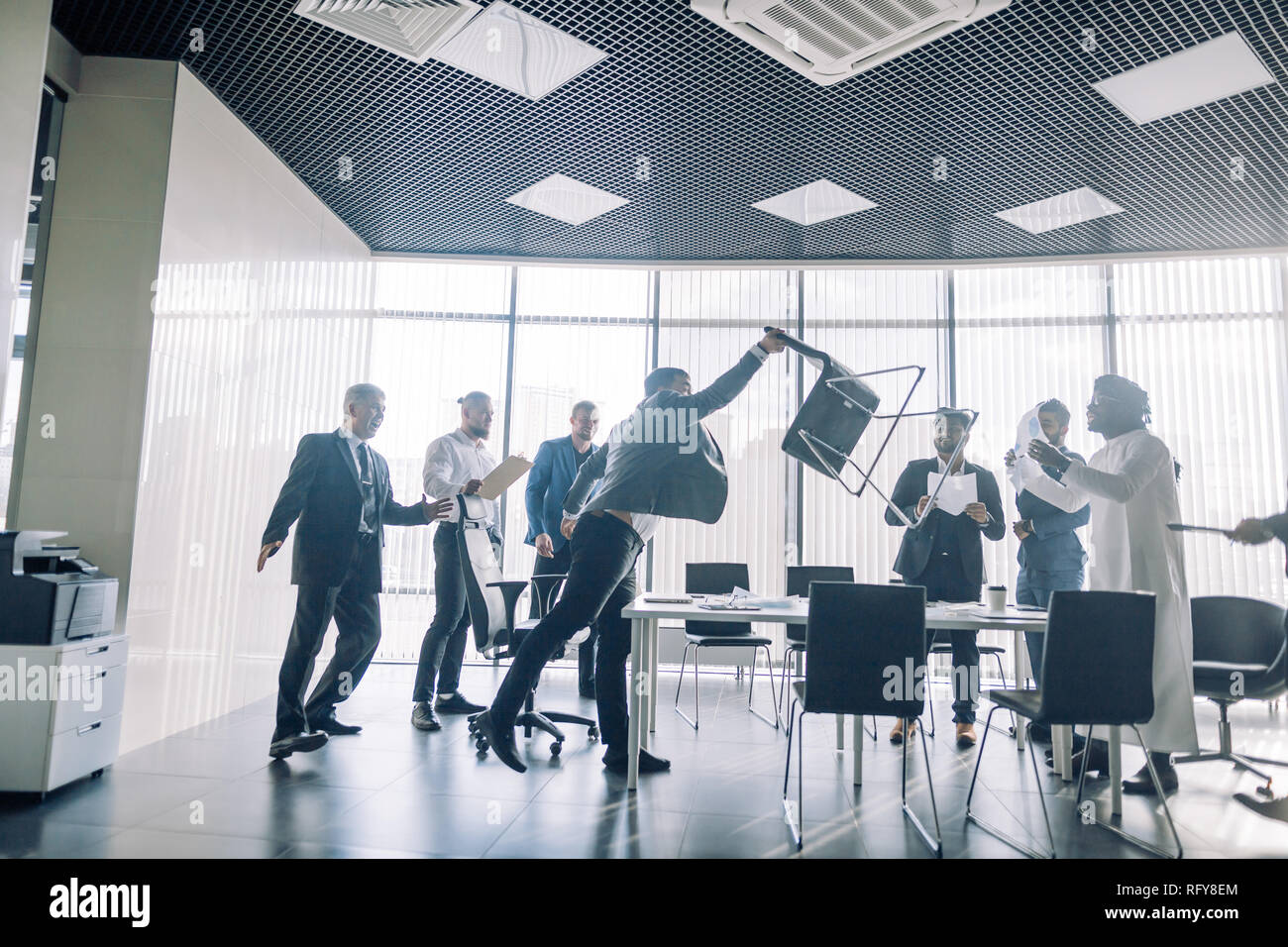 Multiracial partners dispute at negotiations, having fun while settling ...