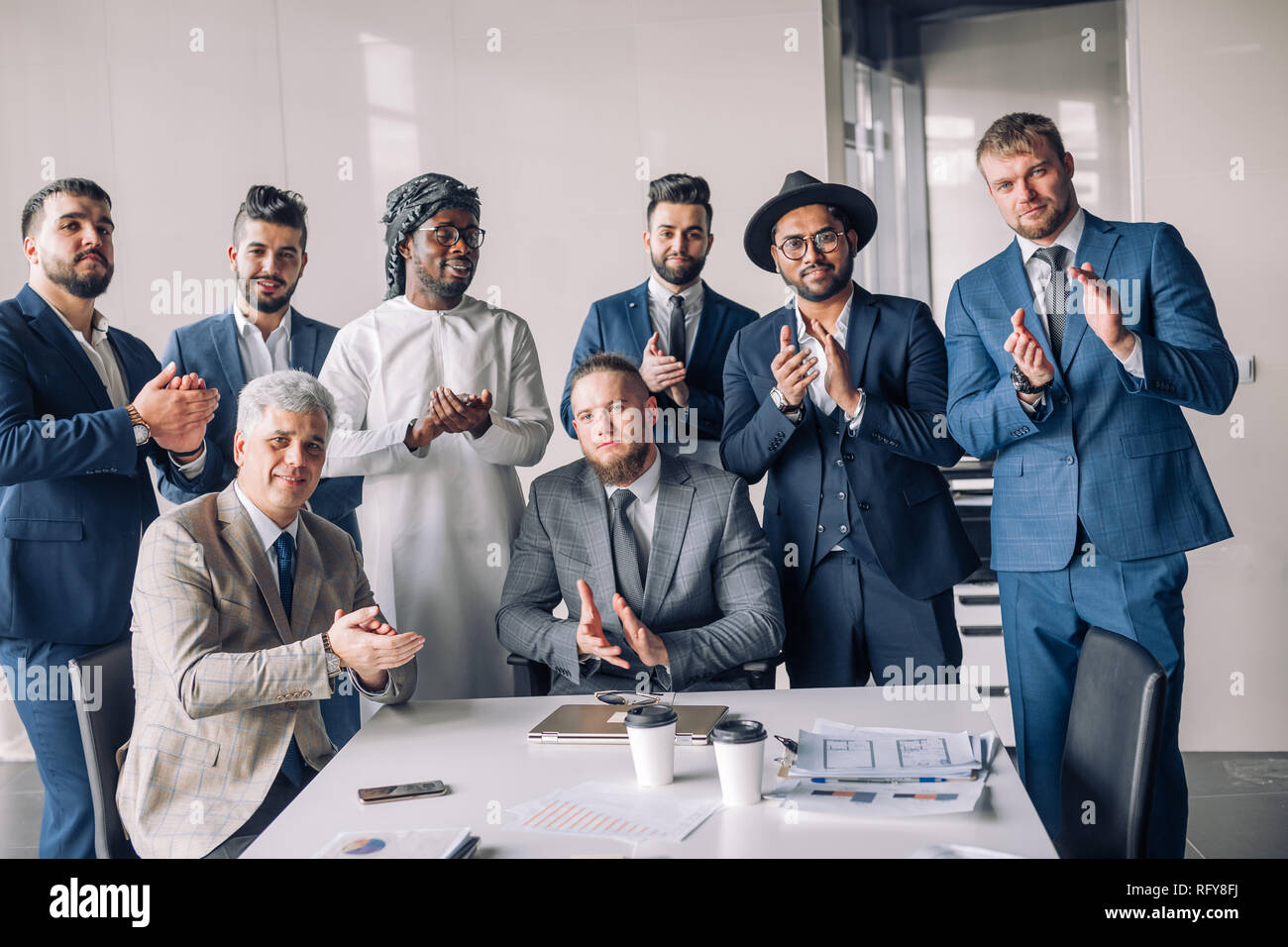 Multiracial group of business team consisting of men only with ...