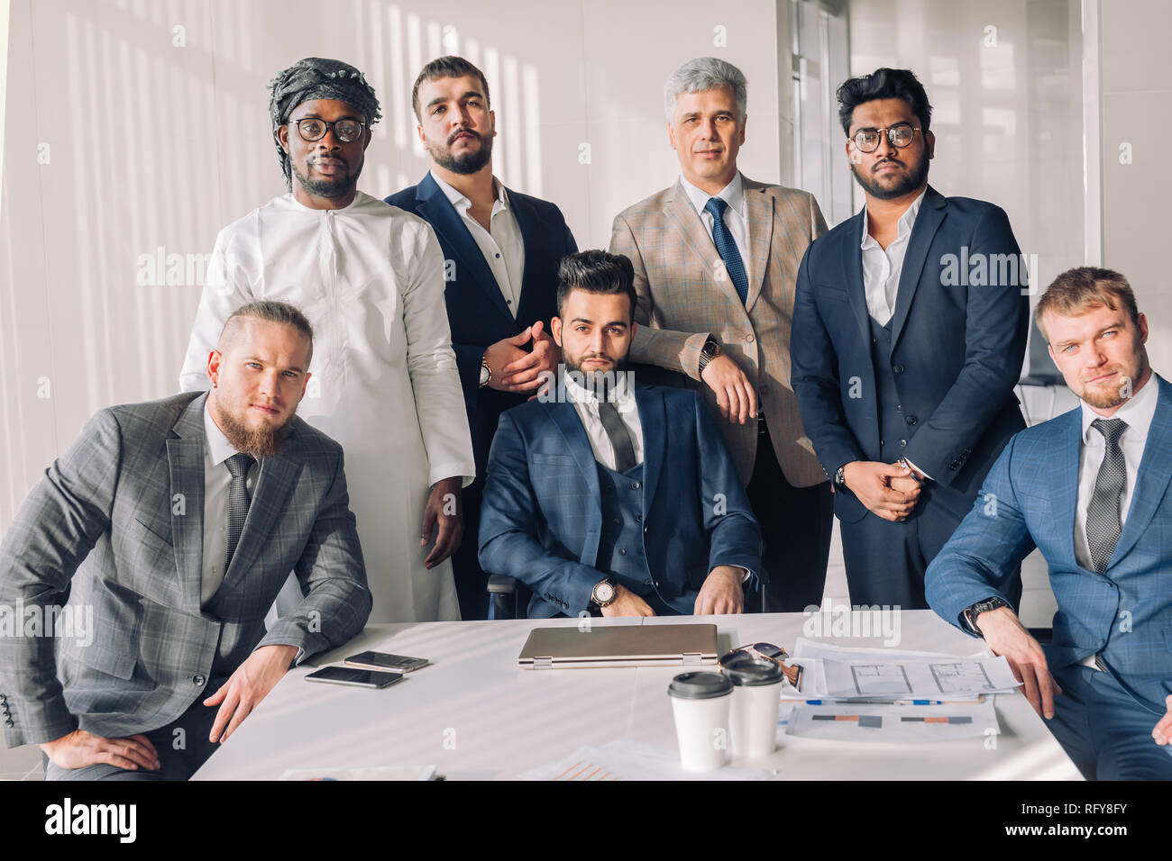 Multiracial group of business team consisting of men only with ...