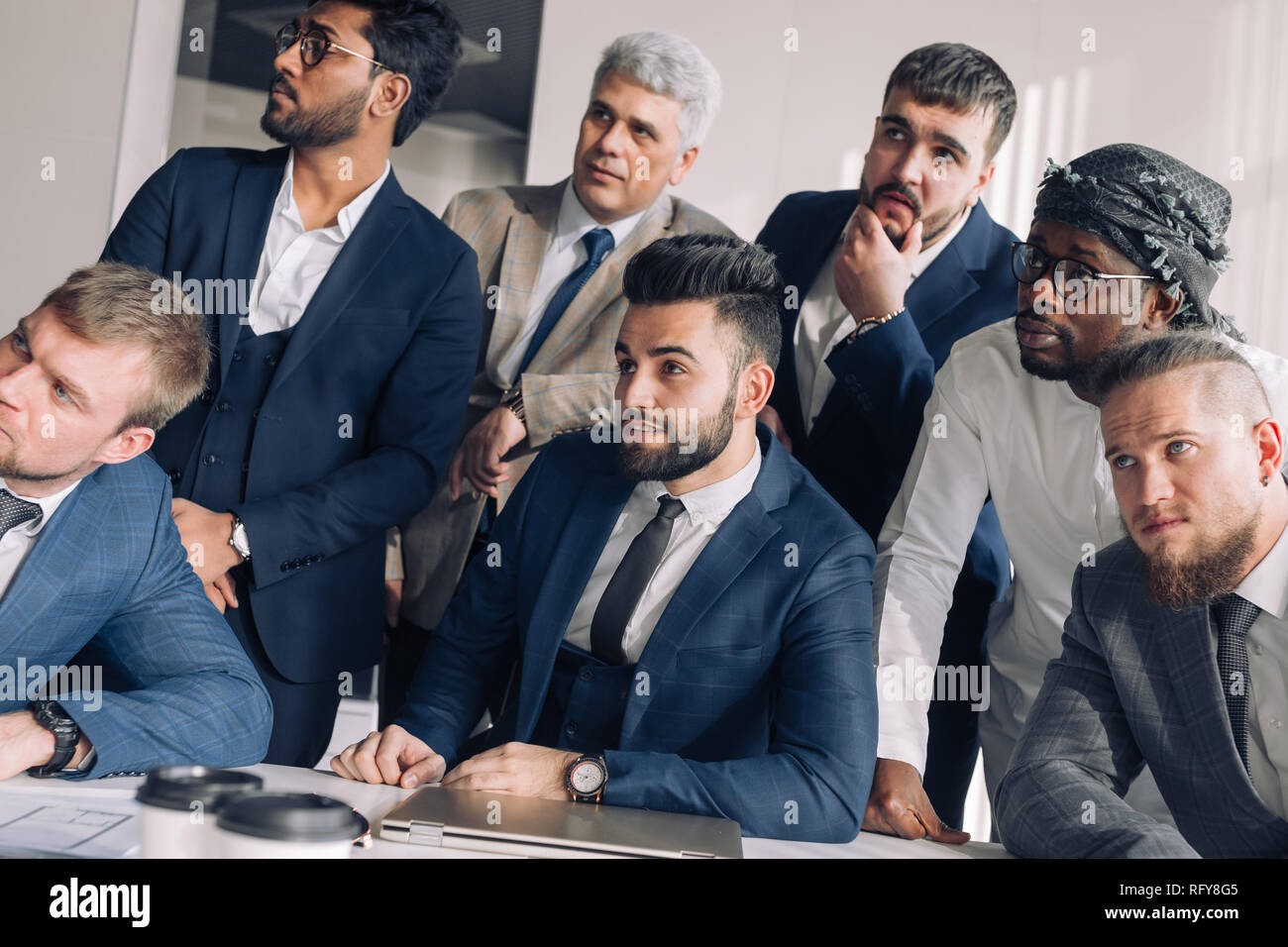Multiracial group of business team consisting of men only with ...