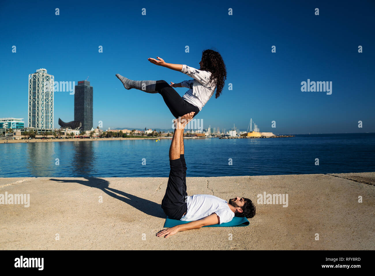 Acro yoga pose hi-res stock photography and images - Alamy