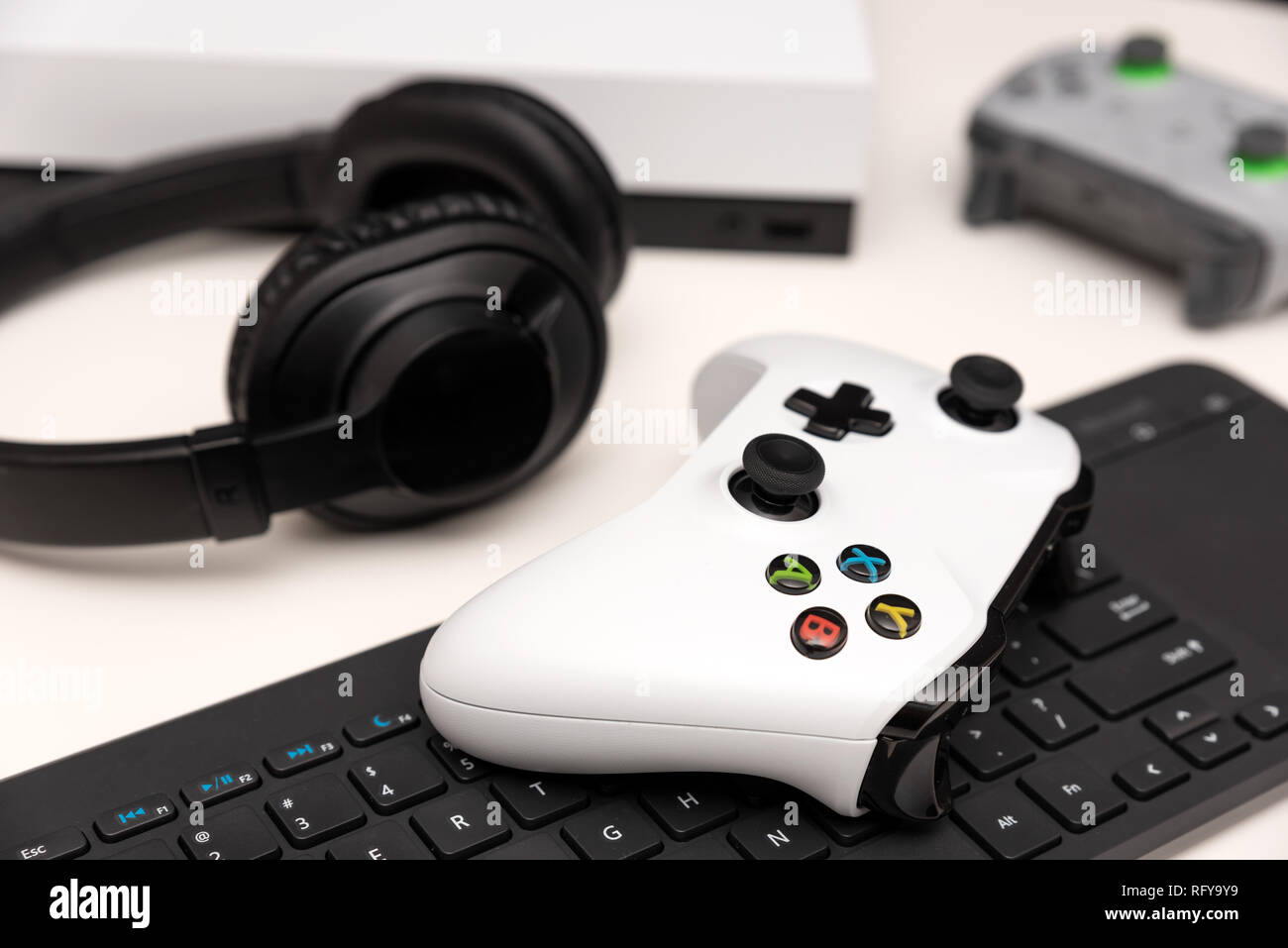 Gaming console and wireless controllers. Video game concept Stock Photo ...