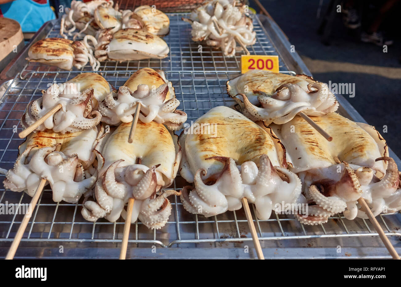 Thailand food stall with fresh octopus for sale Stock Photo - Alamy
