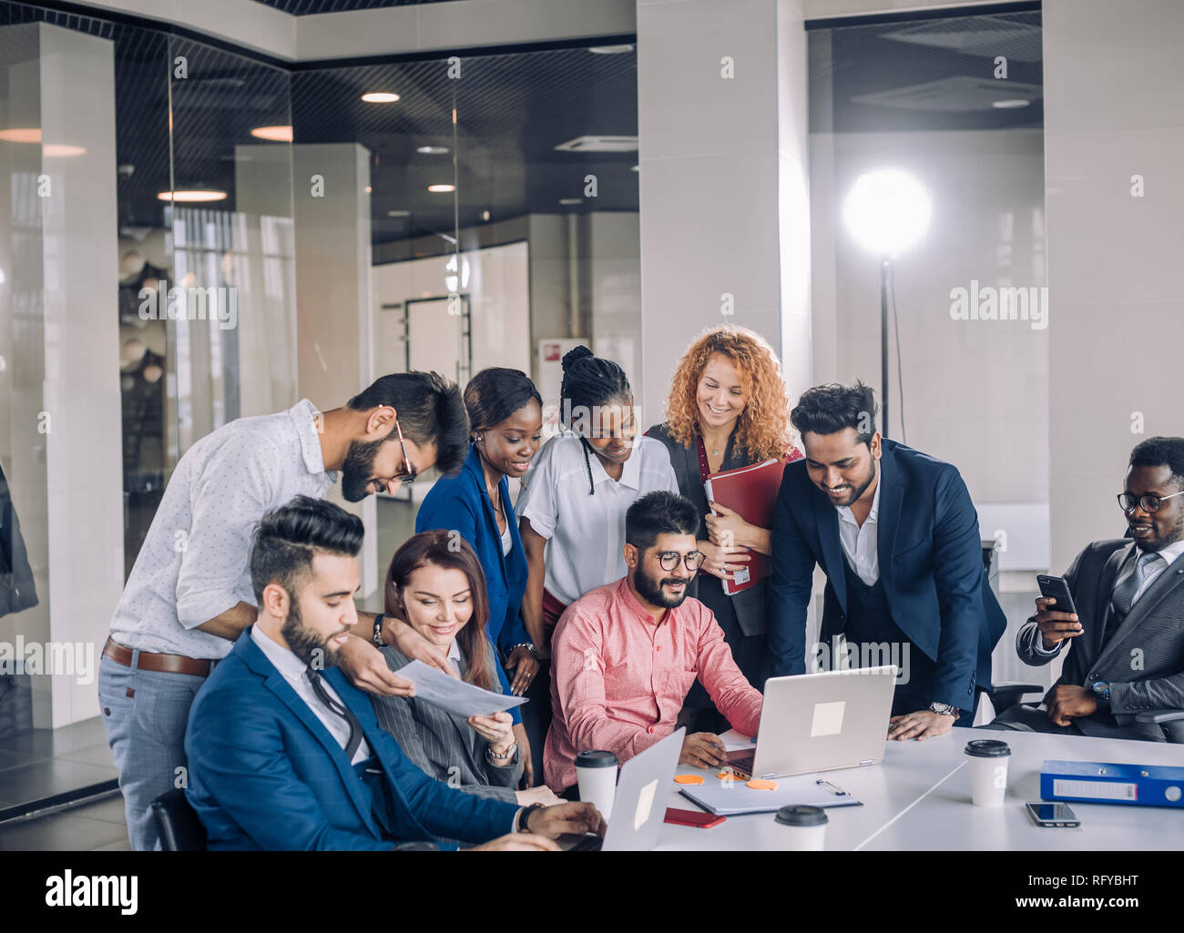 Company multiracial coworkers gathering hi-res stock photography and ...