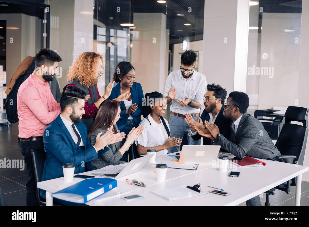 Group young students around laptop hi-res stock photography and images ...