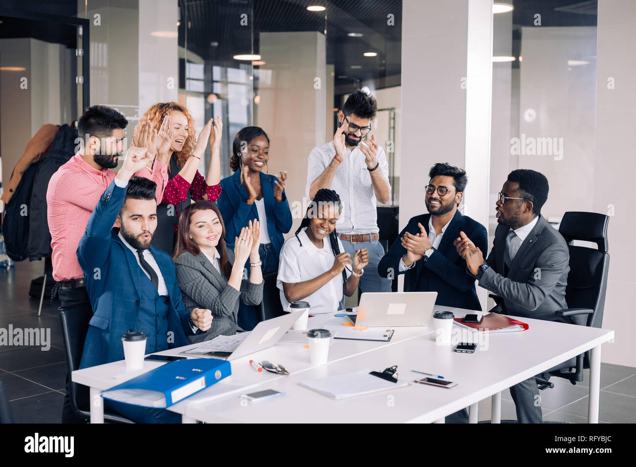 Group young students around laptop hi-res stock photography and images ...