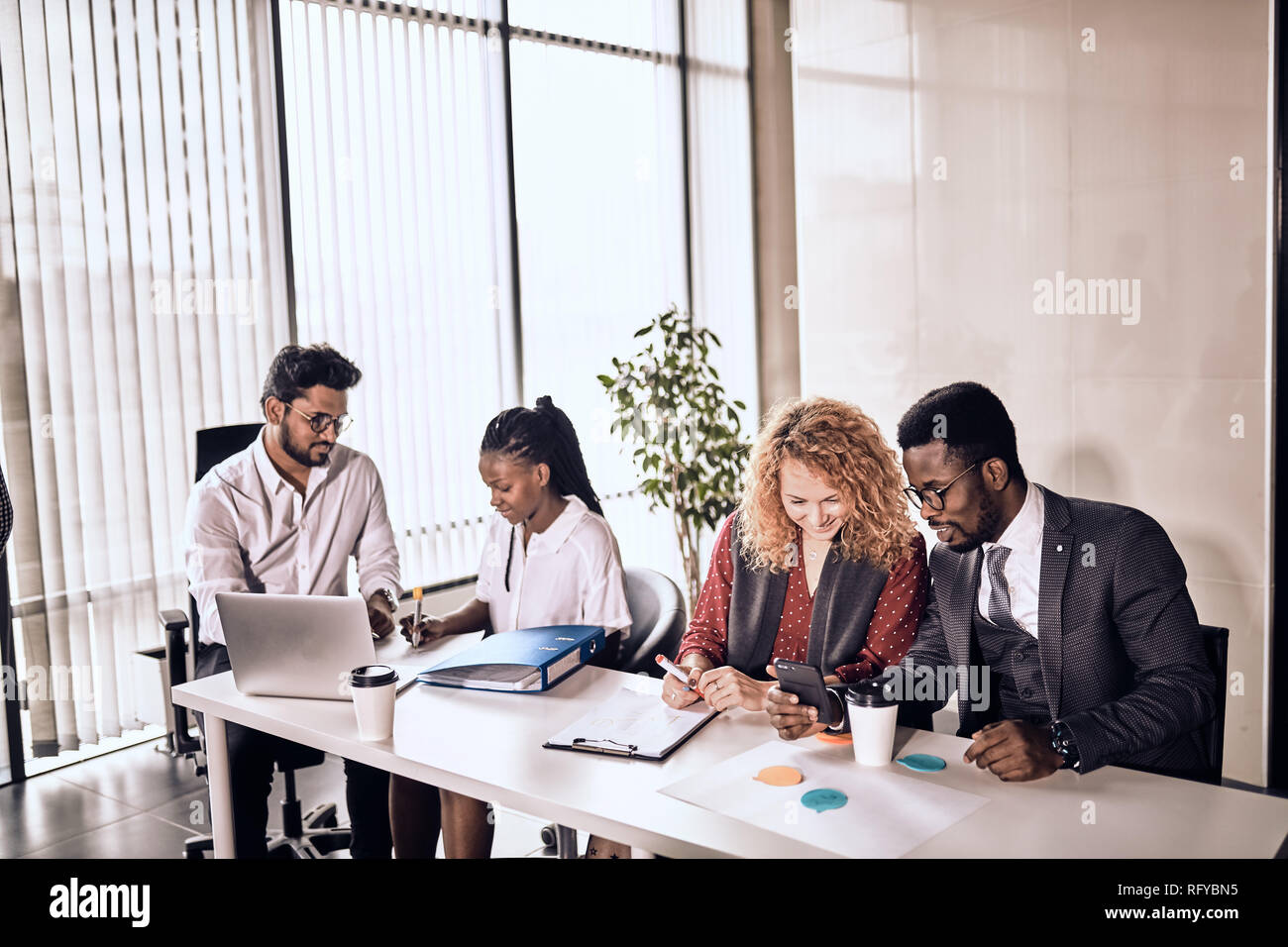 office people are working in groups Stock Photo - Alamy