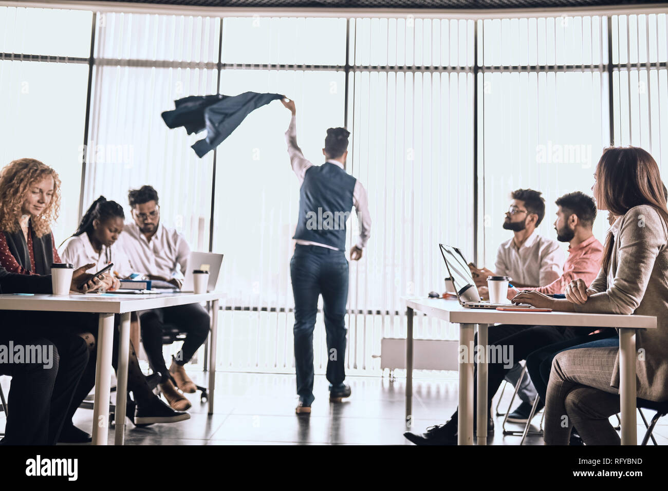 Trying to get attention hi-res stock photography and images - Alamy
