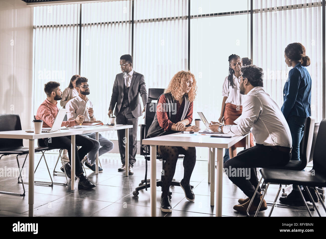 friendly staff working to achieve common goals Stock Photo - Alamy
