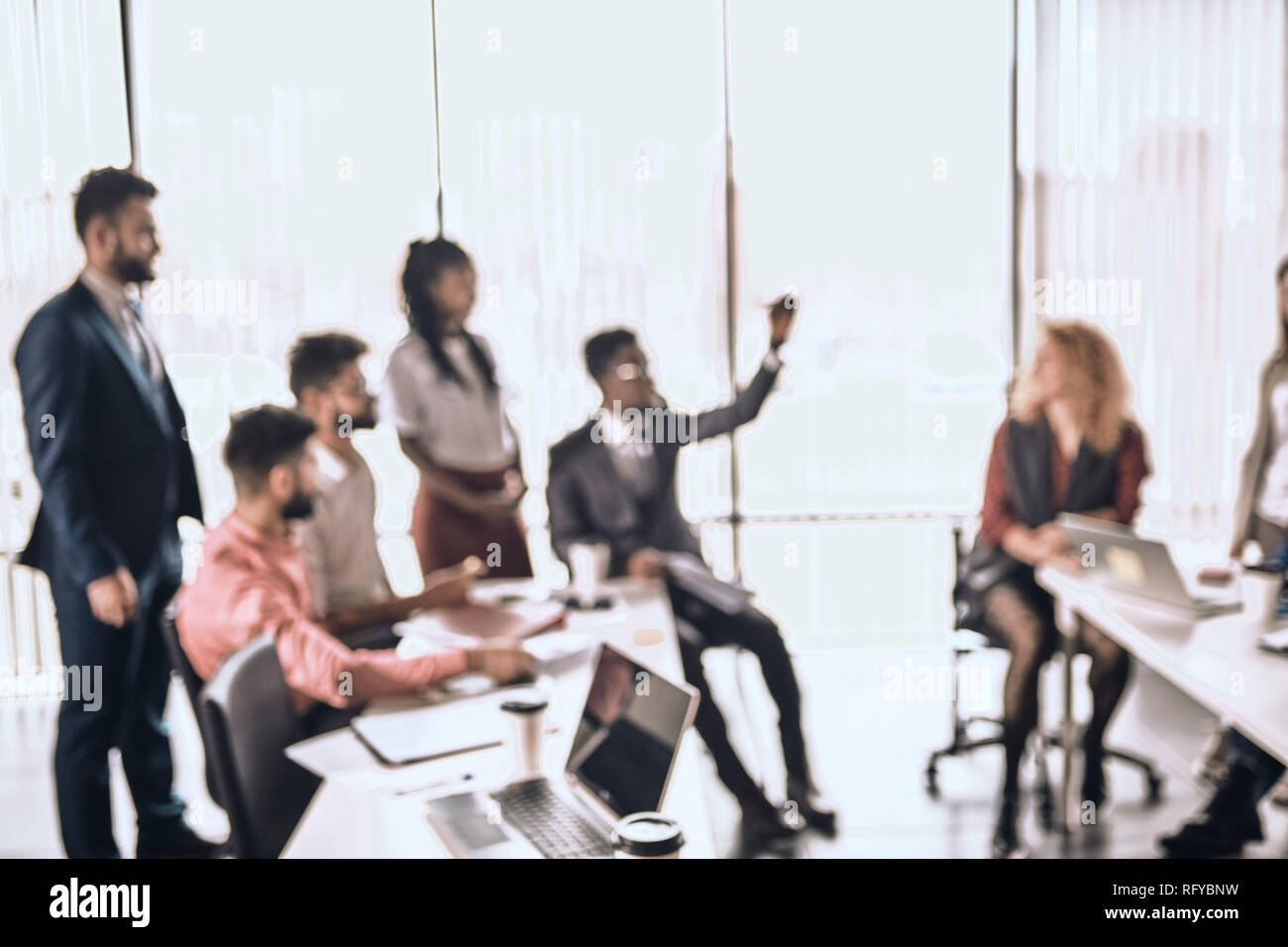 blurred image. business people are having a chat Stock Photo - Alamy