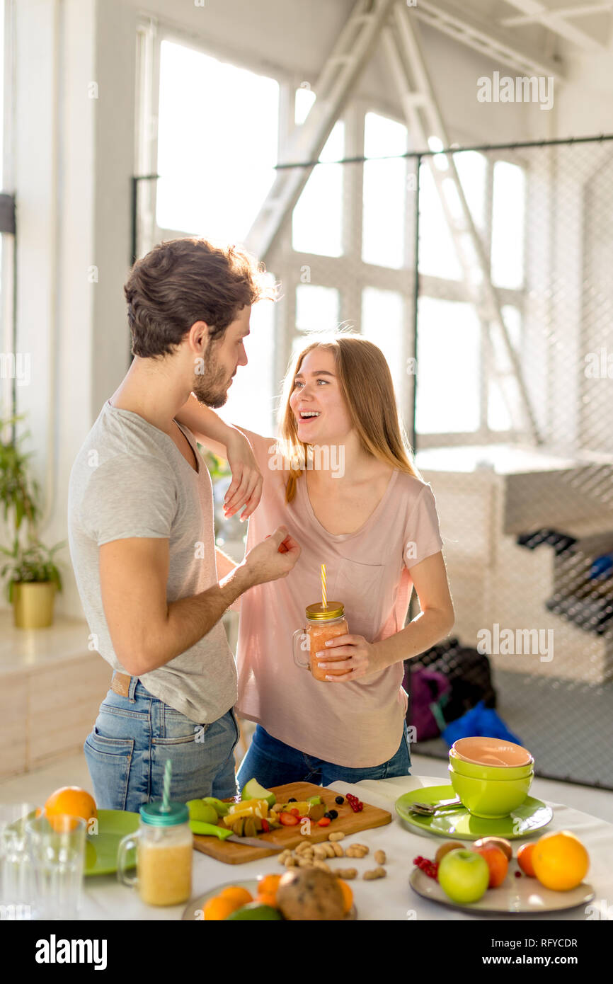 emotional beautiful girl is flirting with a attractive guy in the ...