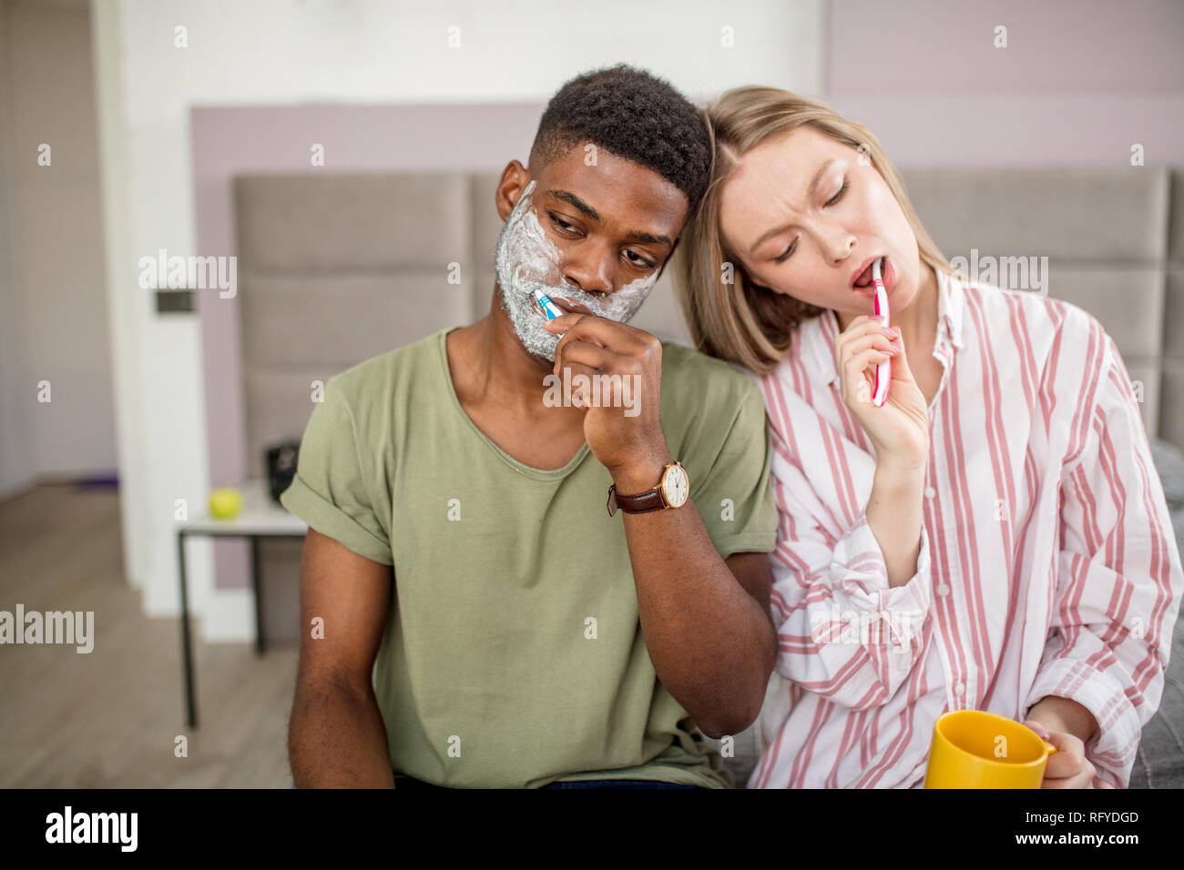 Couple washing teeth in morning, daily routine dental care Stock Photo ...