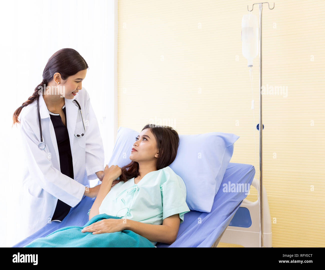 medical doctor touch on patient's sholder to cheer up patient Stock ...