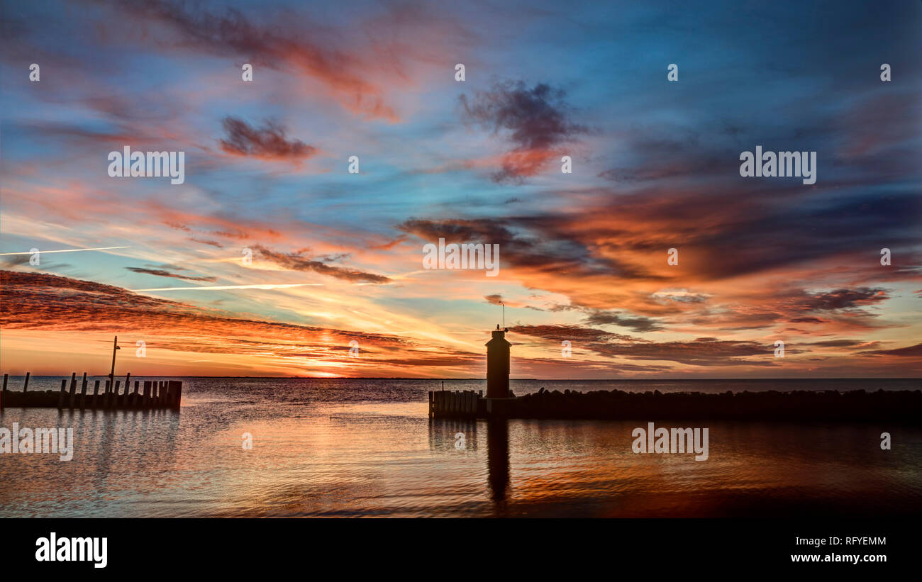 Sunrise at the small harbour Hou, Denmark Stock Photo - Alamy