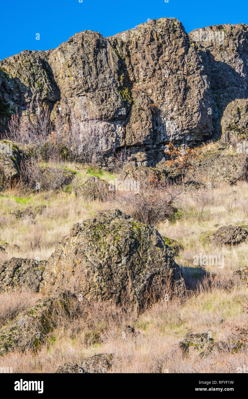 Columbia River Basalt cliff and boulders, located about 1 mile west of ...