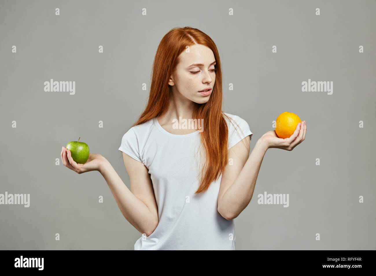 Apples and oranges comparison High Resolution Stock Photography and ...