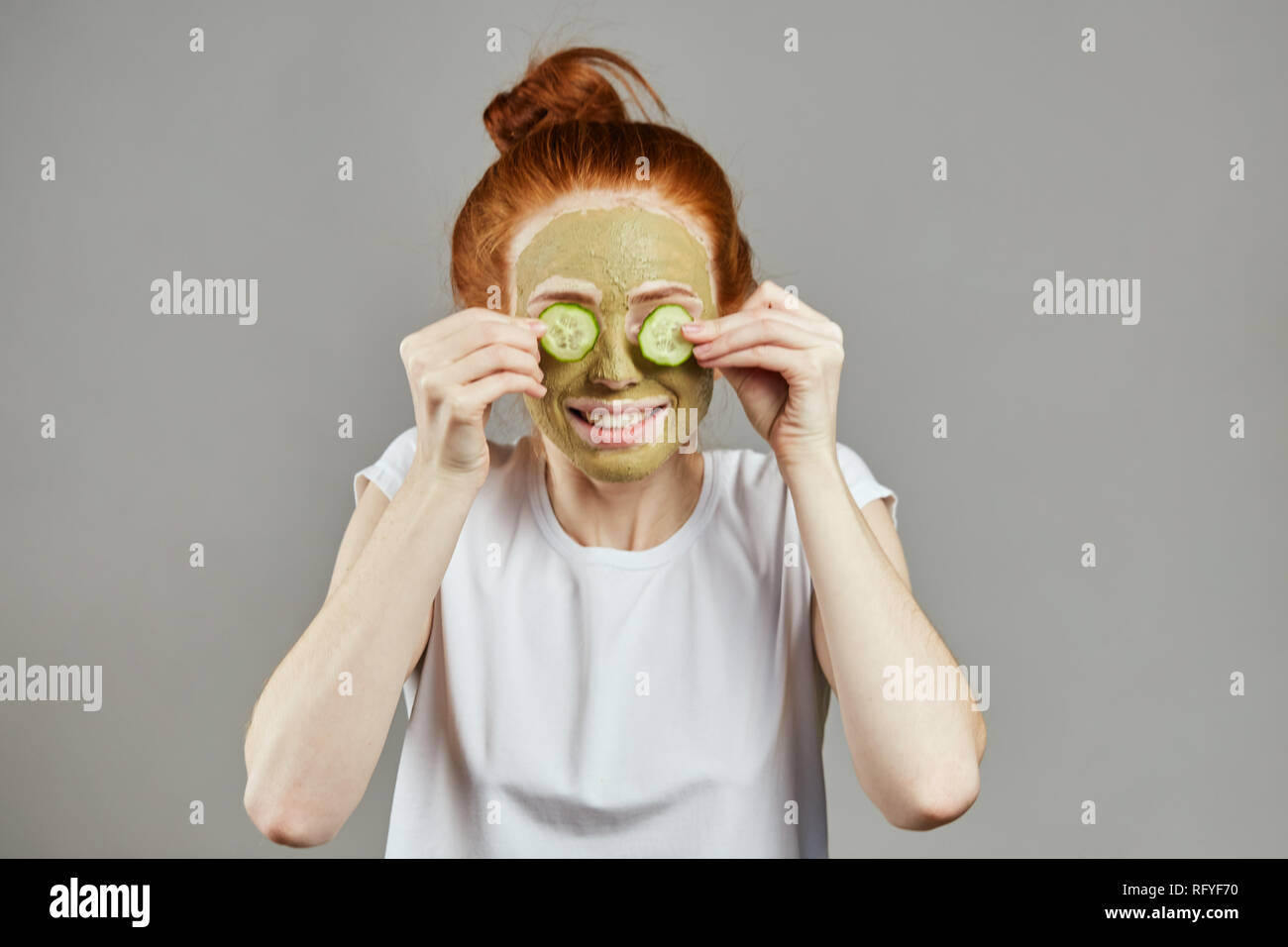 ginger girl is making a mask Stock Photo - Alamy