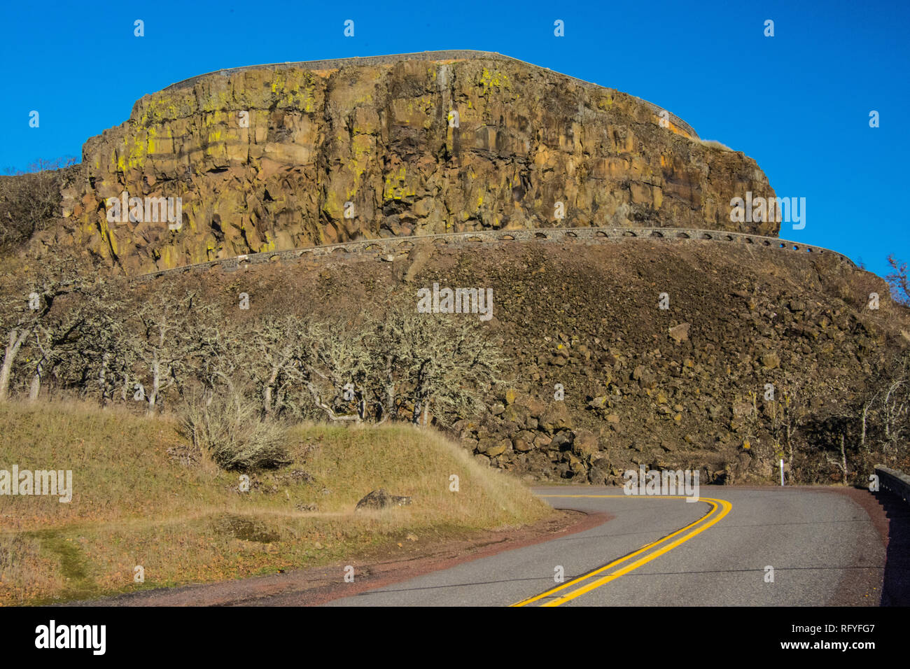 Columbia River Basalt cliff and rock-slide, next to State Hwy. 30 along ...