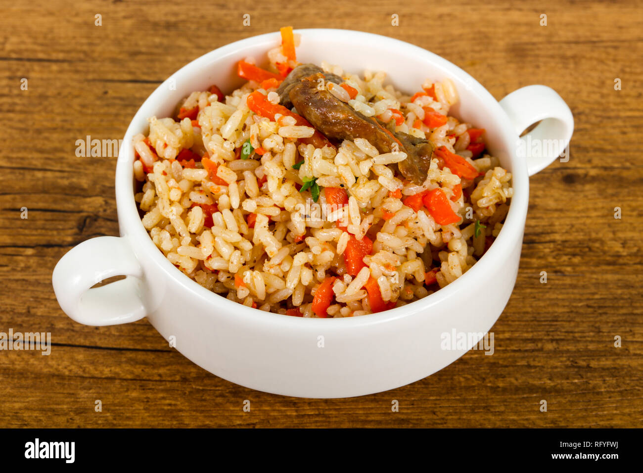 Asian rice - Plov with meat and carrot Stock Photo - Alamy
